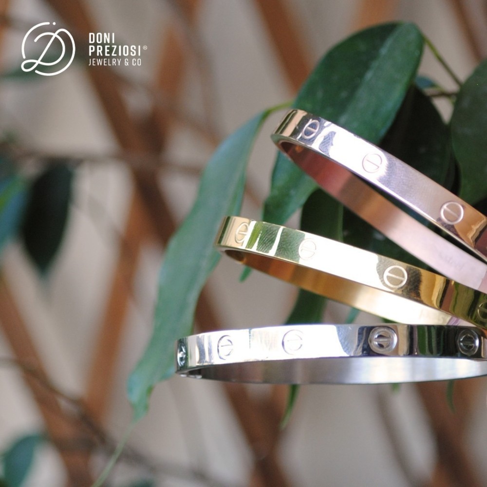 Bracciale donna manetta in acciaio placcato oro